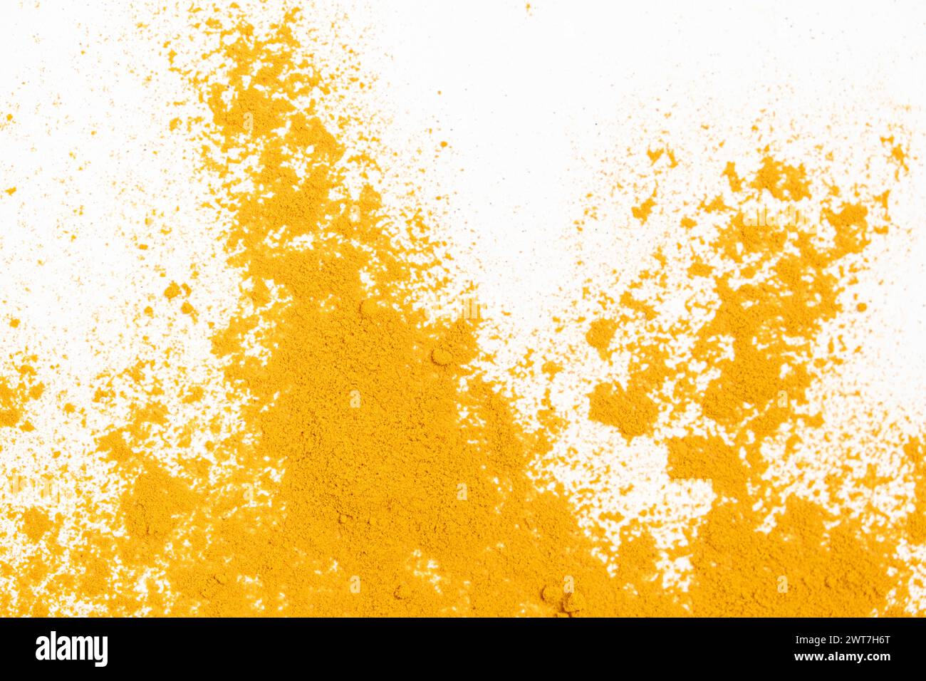 Scattered turmeric powder on white background, turmeric pattern and ...