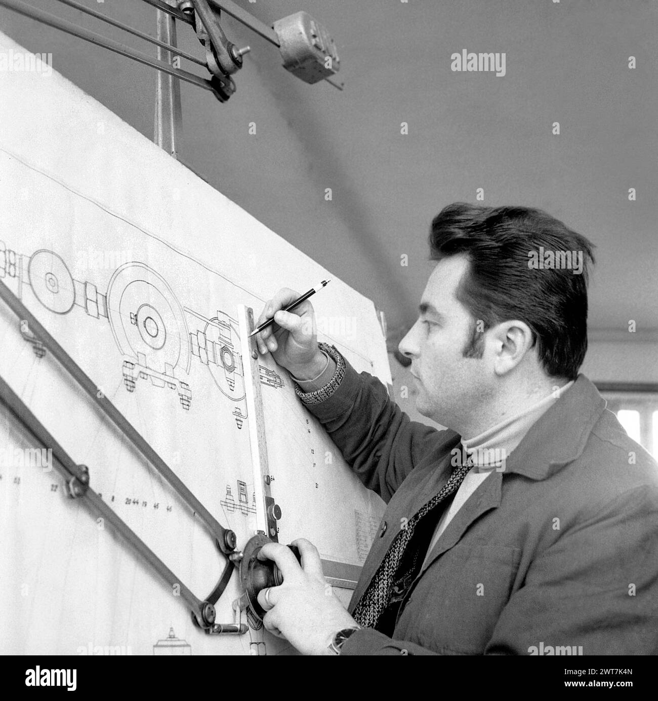 Socialist Republic of Romania, approx. 1978. A design engineer drawing ...