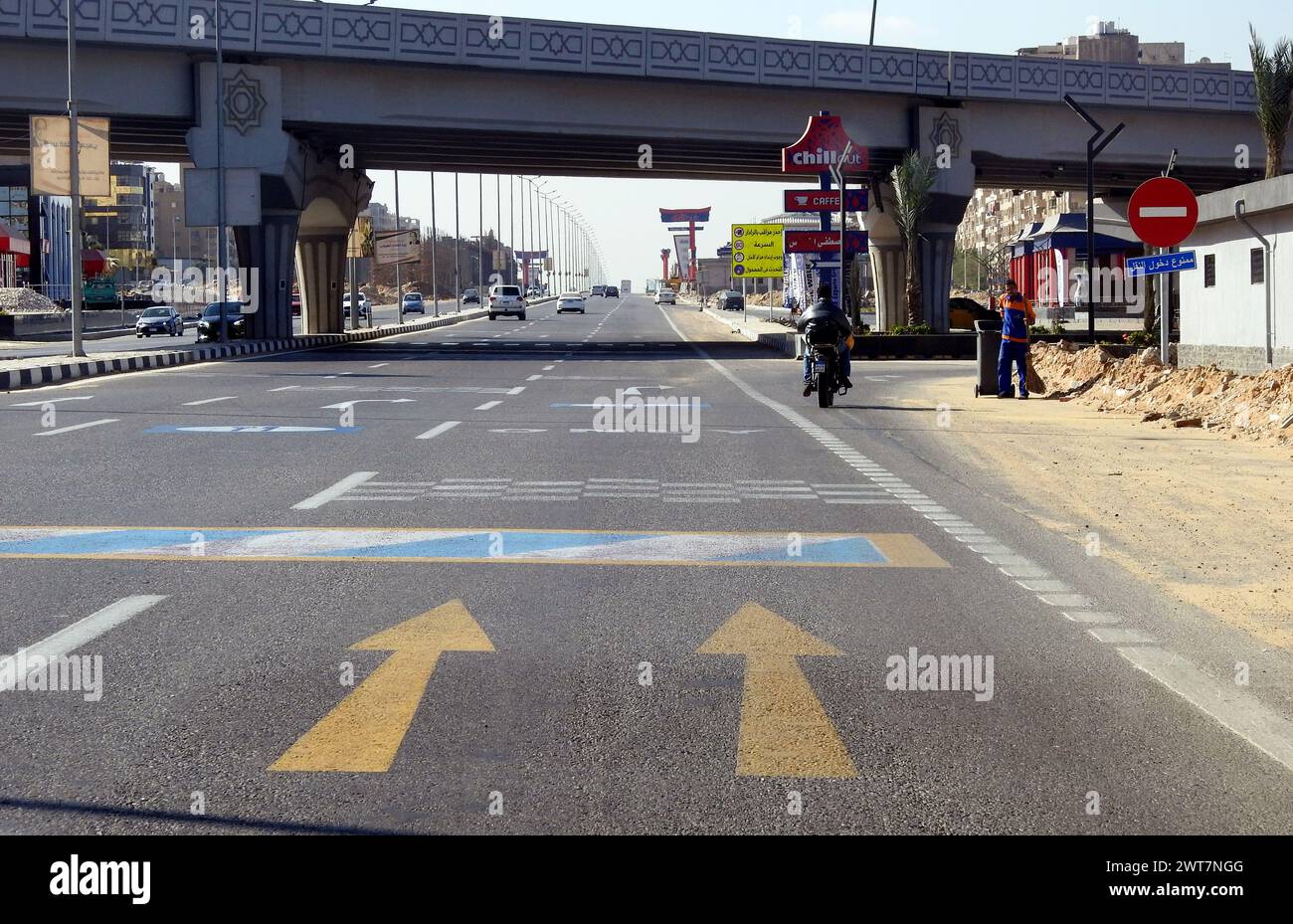 Cairo, Egypt, December 7 2022: A road sign on the asphalt indication a ...