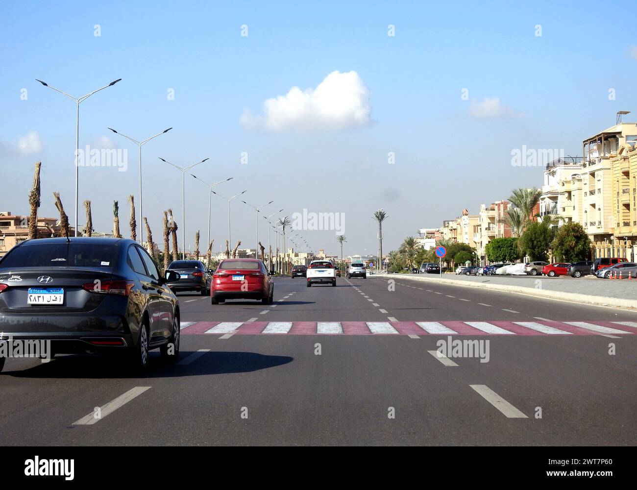 Cairo, Egypt, December 7 2022: A road sign on the asphalt instructing ...