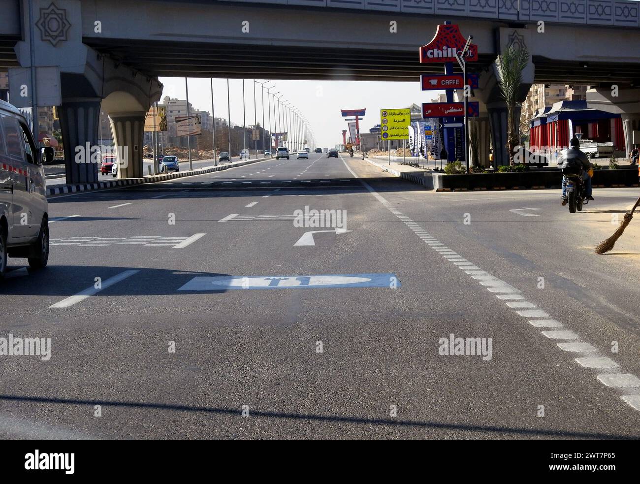 Cairo, Egypt, December 7 2022: A road sign on the asphalt indication a ...