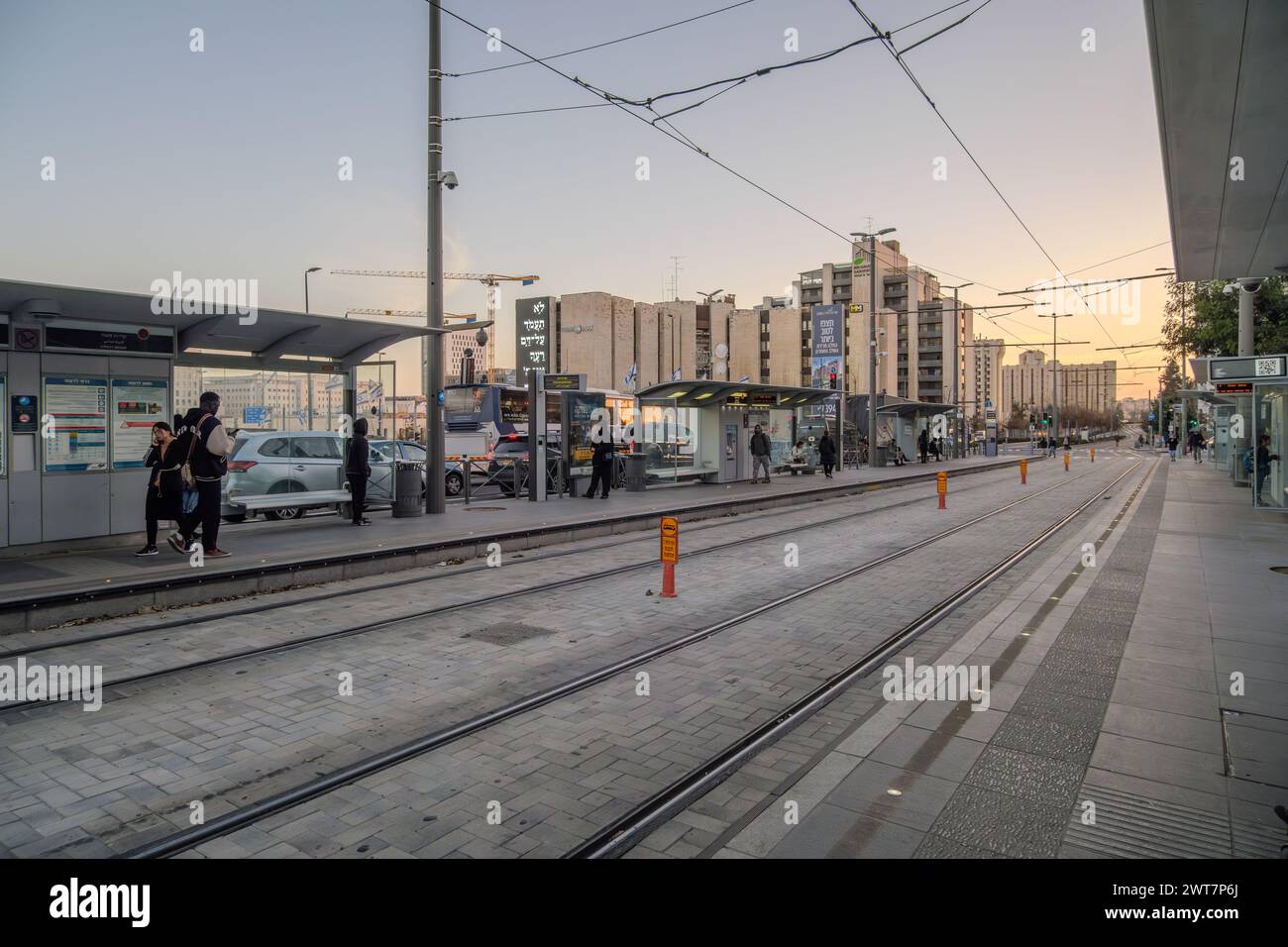 People waiting for the Jerusalem Light Rail (Red Line) on the Kiryat ...