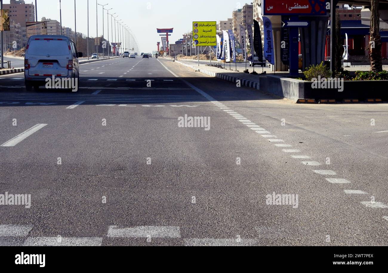 Cairo, Egypt, December 7 2022: A road sign on the asphalt instructing ...