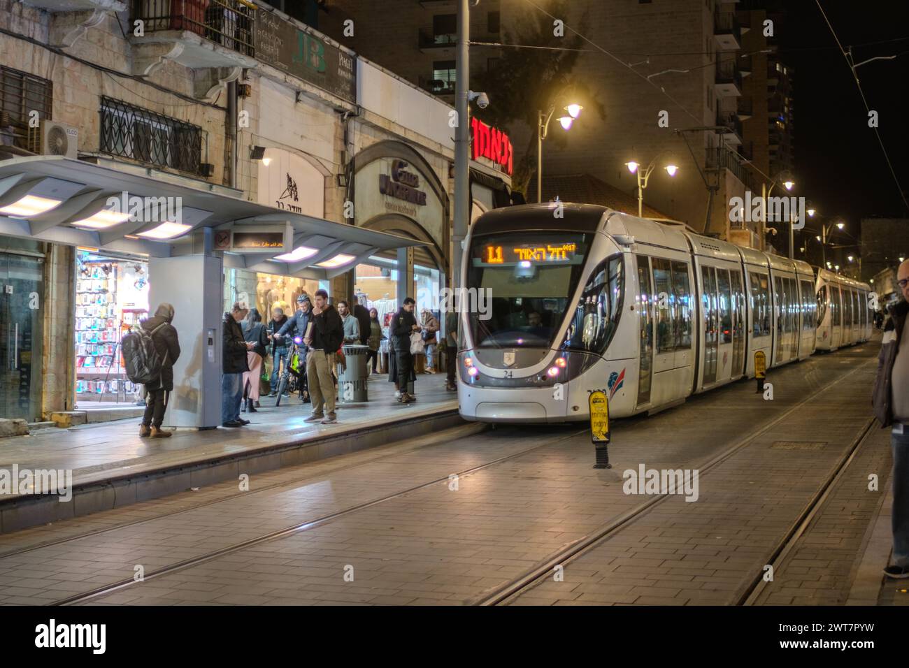 People boarding the Jerusalem Light Rail (Red Line) on Jaffa Road Stock ...