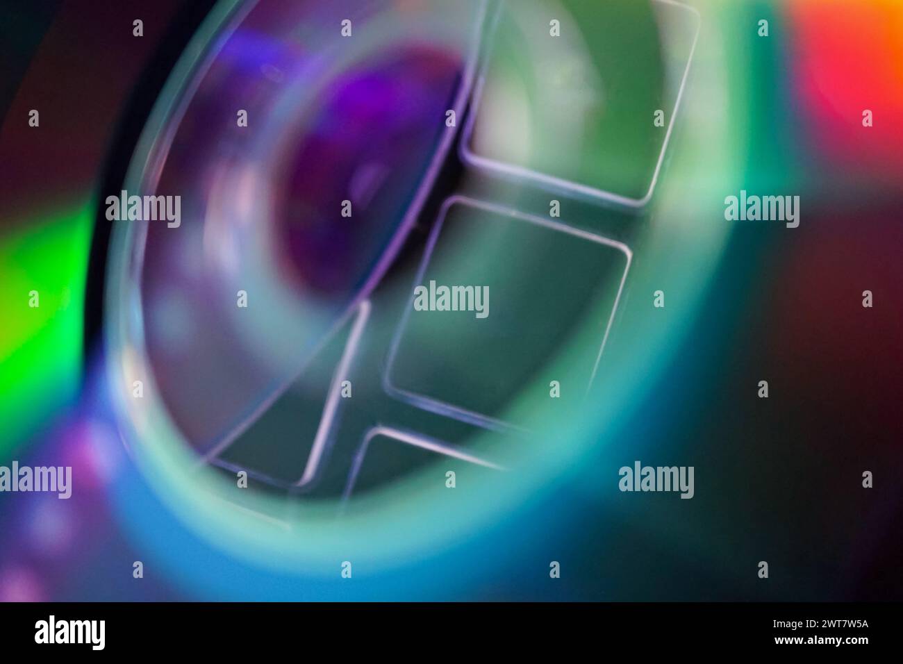 Light and colors reflected on a compact disc Stock Photo - Alamy