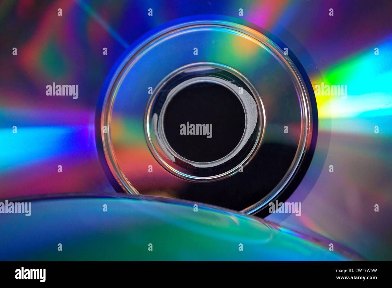 Light and colors reflected on a compact disc Stock Photo - Alamy
