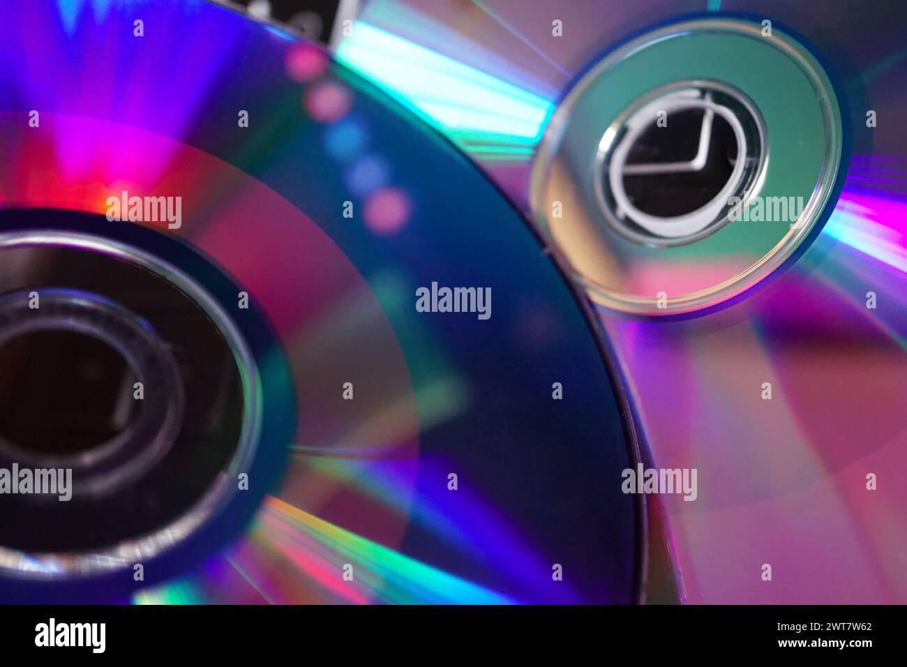 Light and colors reflected on a compact disc Stock Photo - Alamy