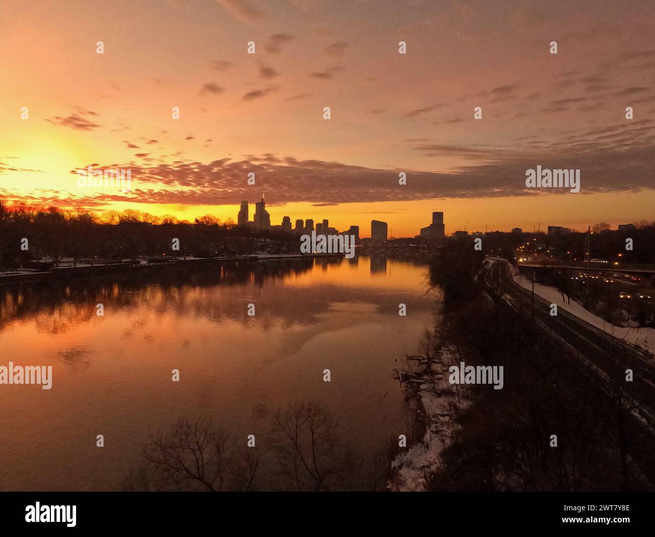 The sun rises over the Schuylkill River as seen from the Girard Avenue ...