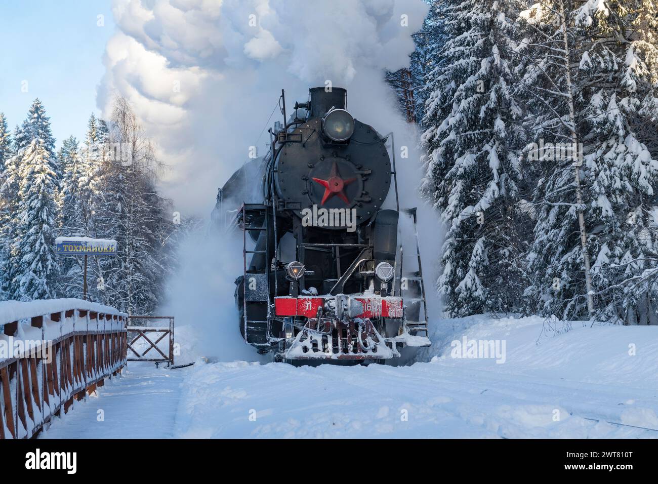 RUSKEALA, RUSSIA - JANUARY 20, 2024: The retro train "Ruskeala Express ...