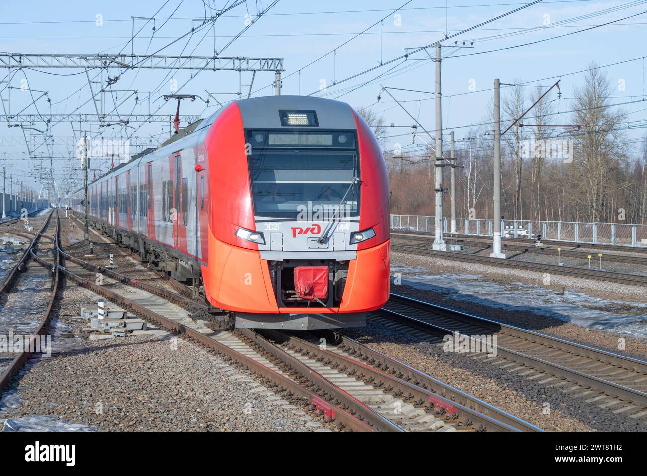 PETRO-SLAVYANKA, RUSSIA - MARCH 04, 2024: Electric train ES2G-144 "Lastochka" arrives on the ...