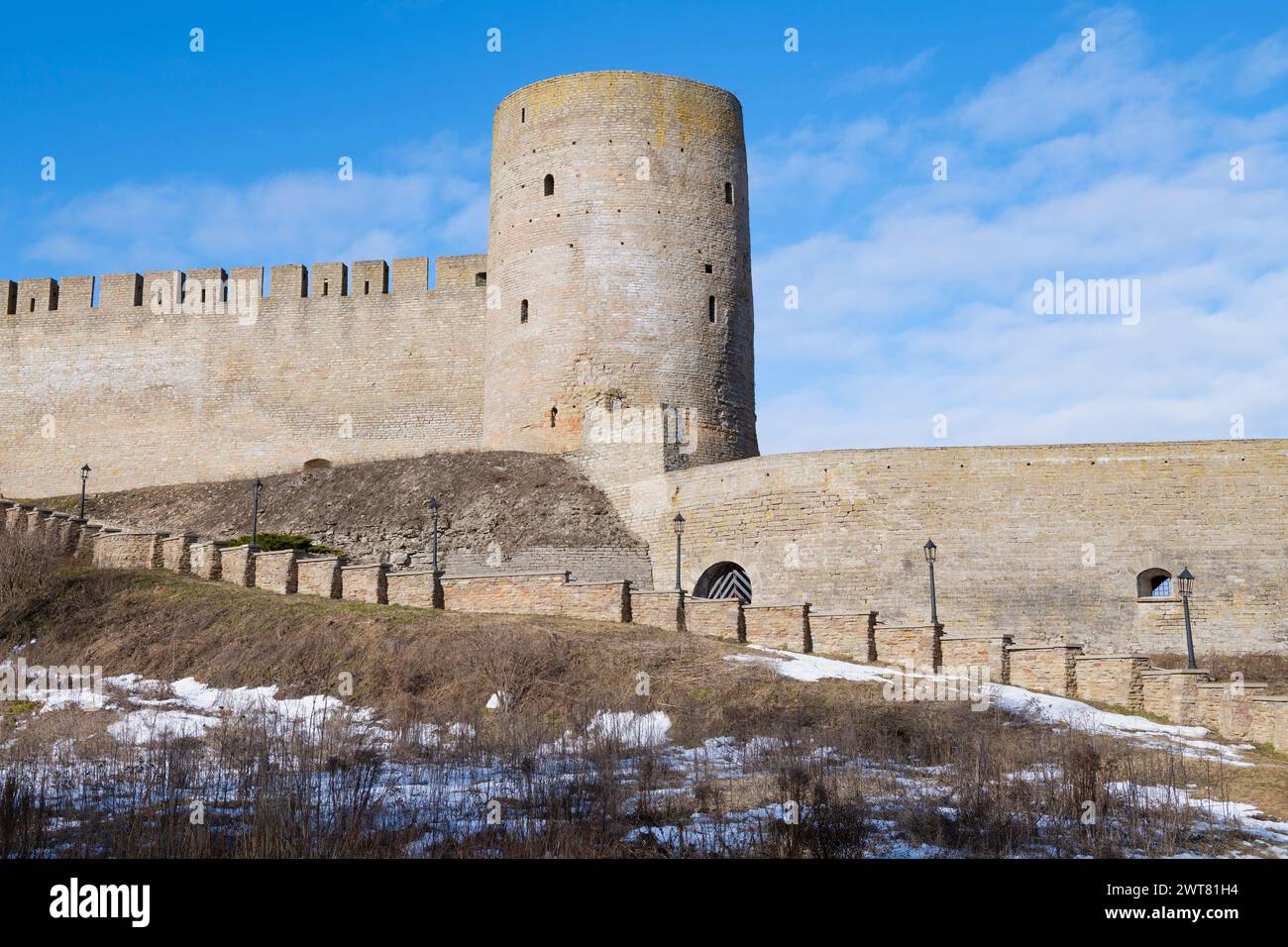 The ancient Long-neck tower of the Ivangorod fortress on a sunny March ...