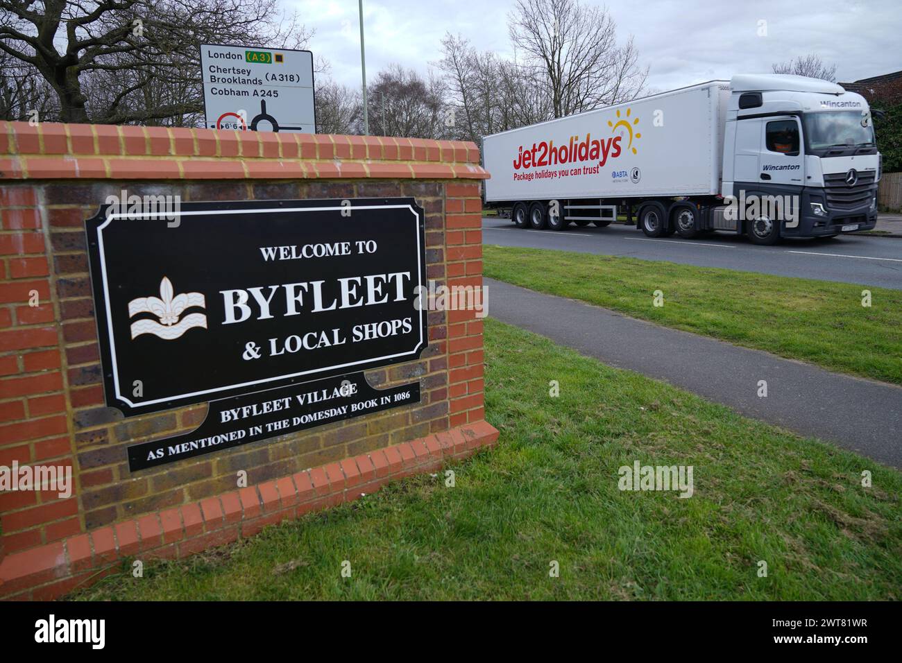 Vehicles in Byfleet, near to a closed section of the M25 between ...