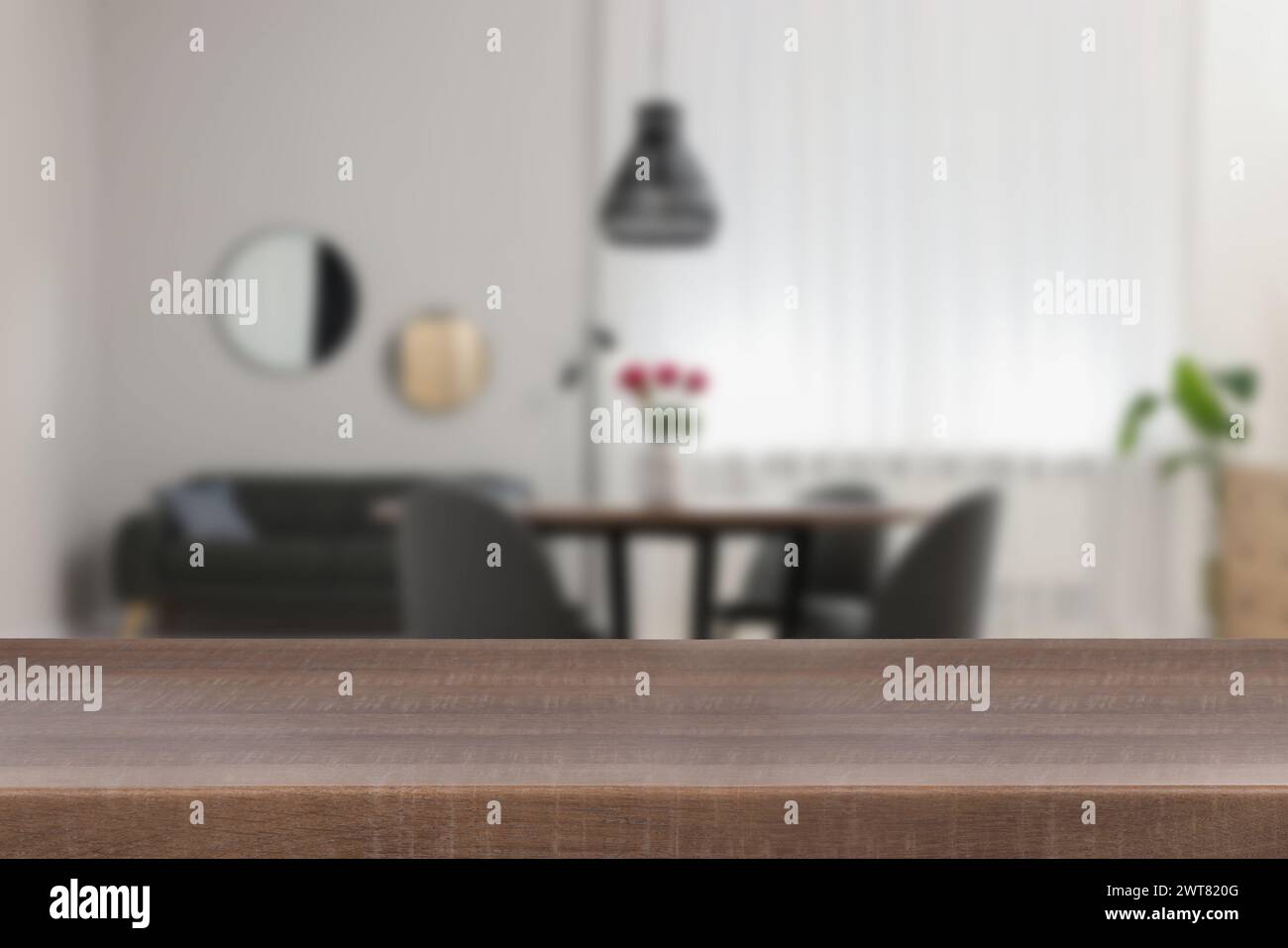 Empty wooden table in dining room. Space for design Stock Photo - Alamy