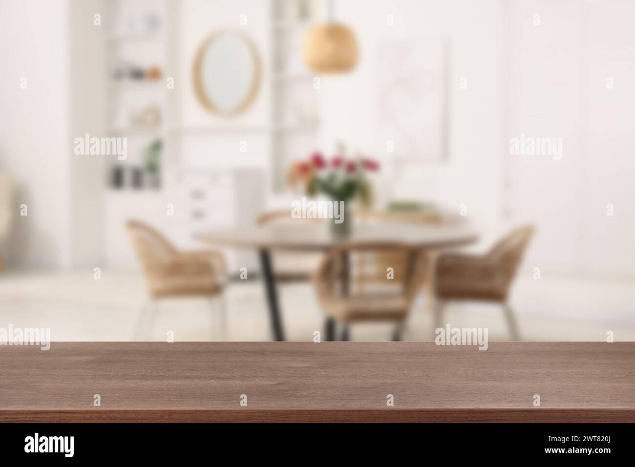 Empty wooden table in dining room. Space for design Stock Photo - Alamy