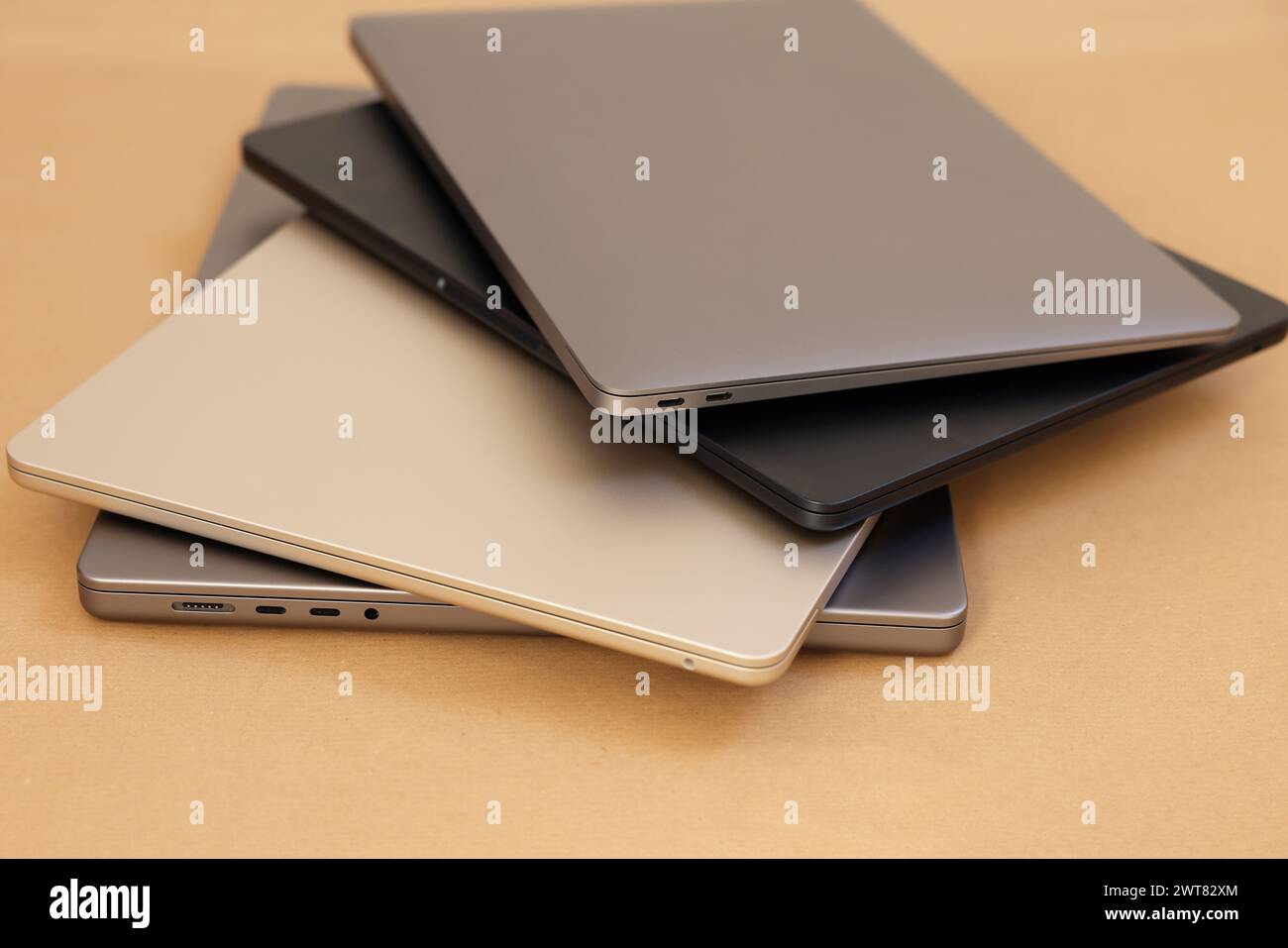 Stack of laptops and table hi-res stock photography and images - Alamy