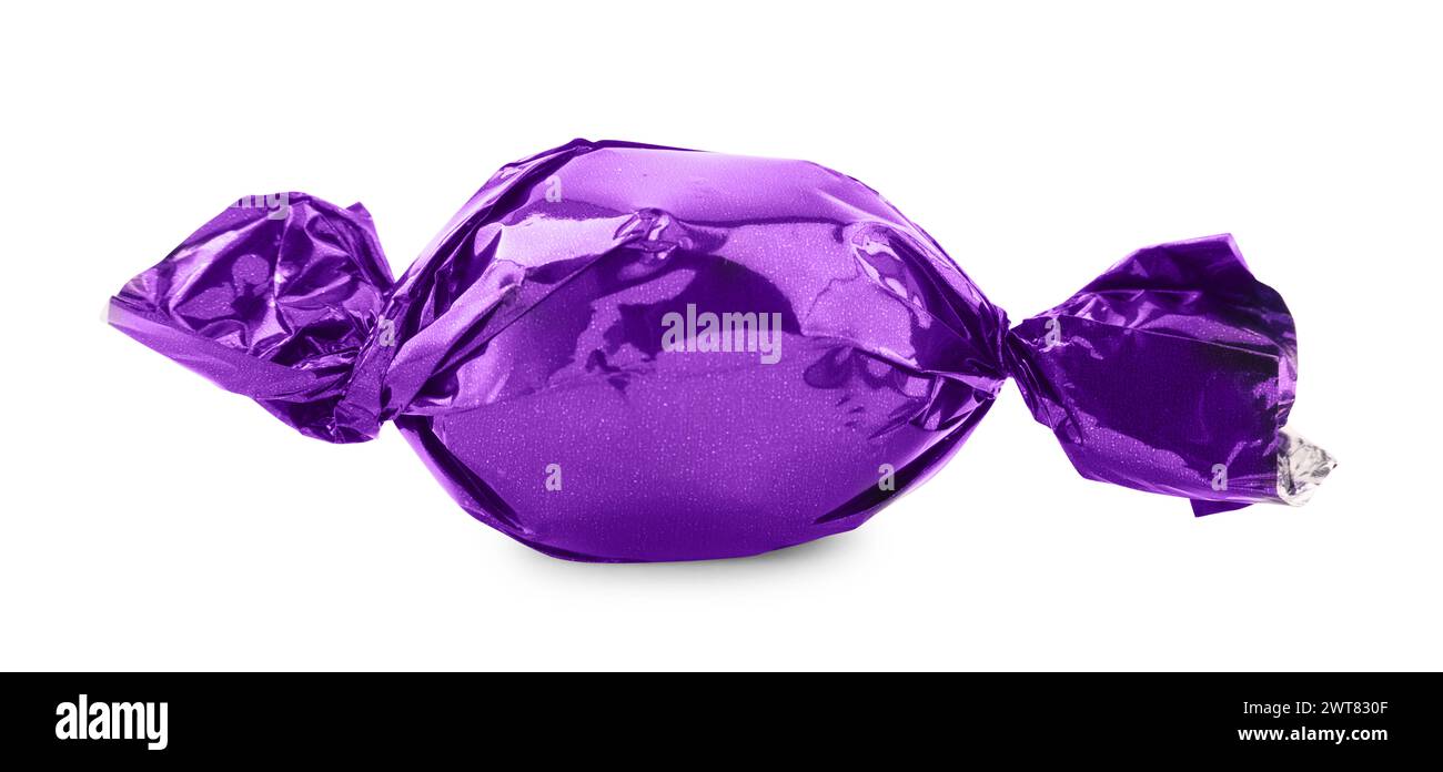 Candy in purple wrapper isolated on white Stock Photo - Alamy