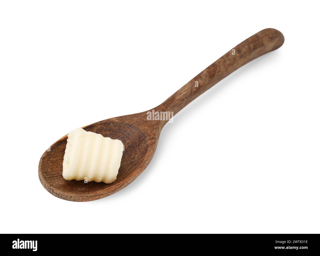 Tasty butter curl in spoon isolated on white Stock Photo - Alamy