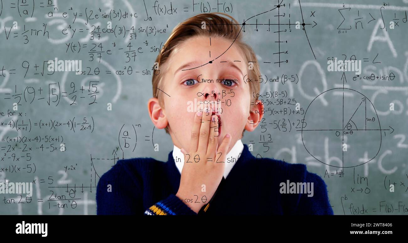 Image of math formulas over scared caucasian boy over blackboard ...