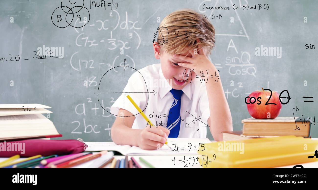 Image of math formulas over focused caucasian boy doing homework Stock ...