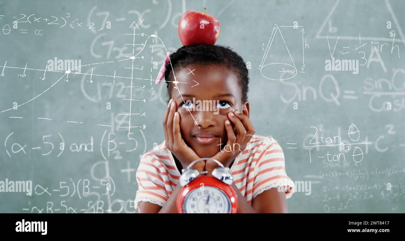 Image of math formulas over thoughtful african americna girl with apple ...