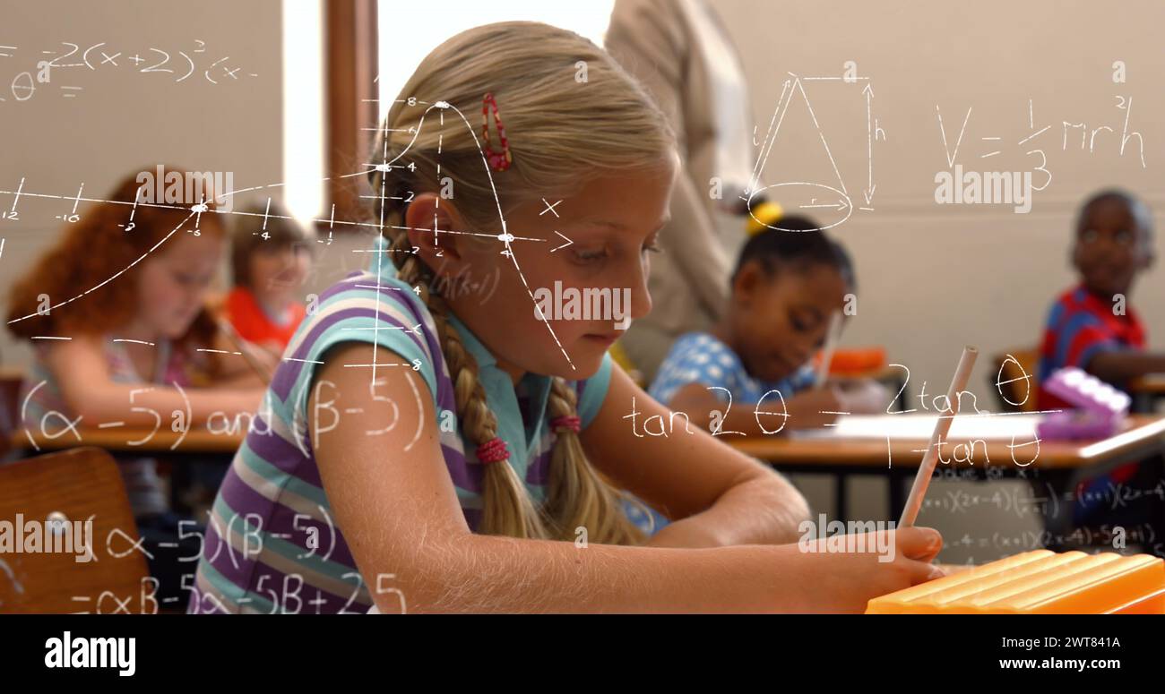 Image of math formulas over focused caucasian girl learning at school ...