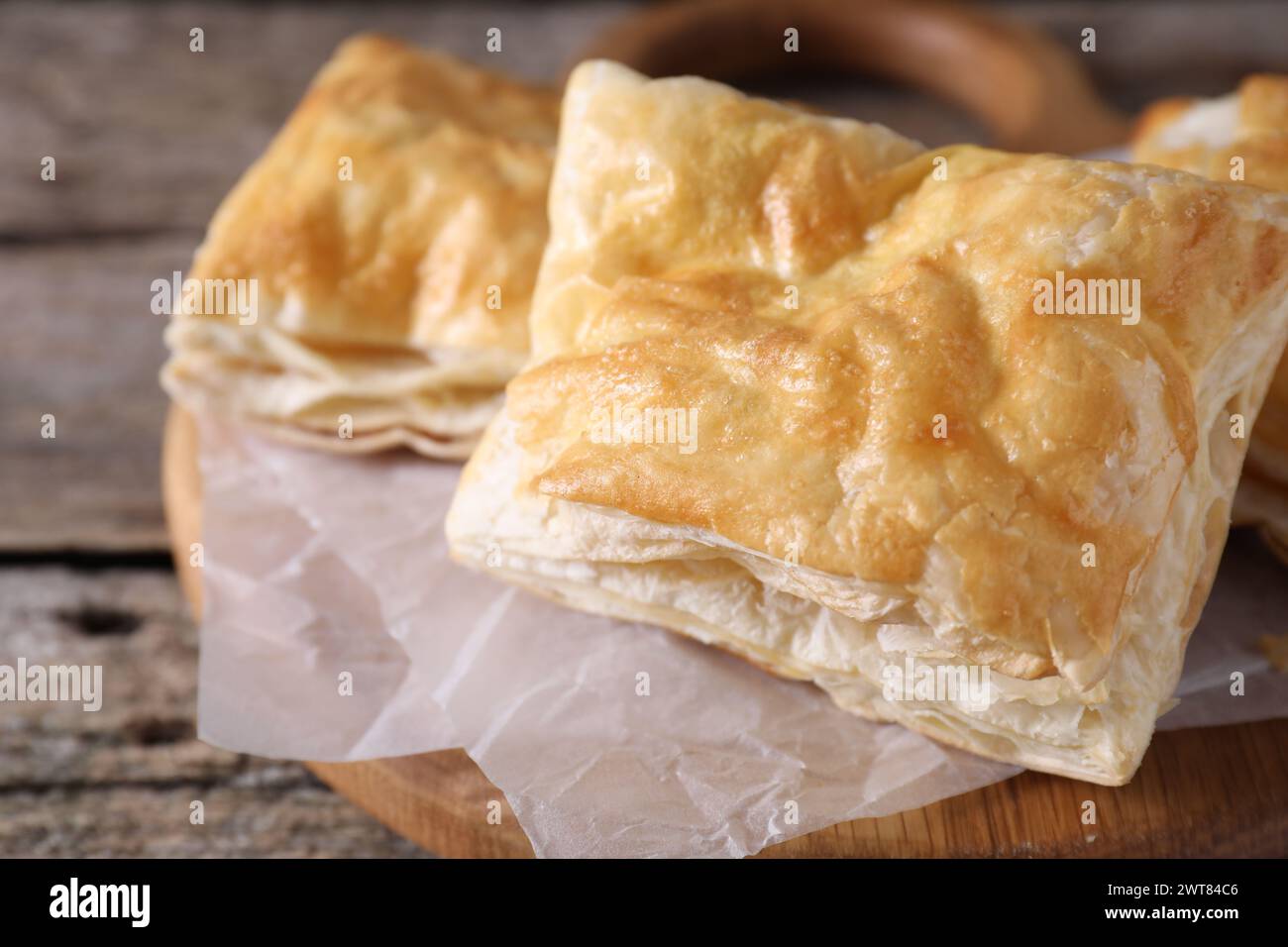 Delicious puff pastry on table, closeup view Stock Photo - Alamy