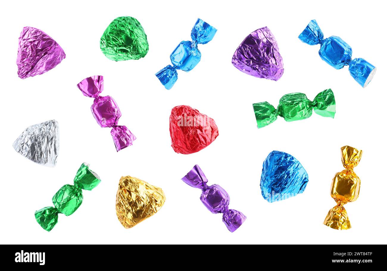 Tasty candies in bright wrappers falling on white background Stock ...