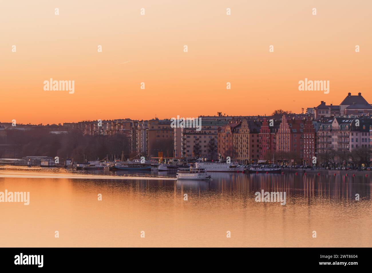 Sunset over Kungsholmen island, Stockholm, Sweden. Orange and pink ...
