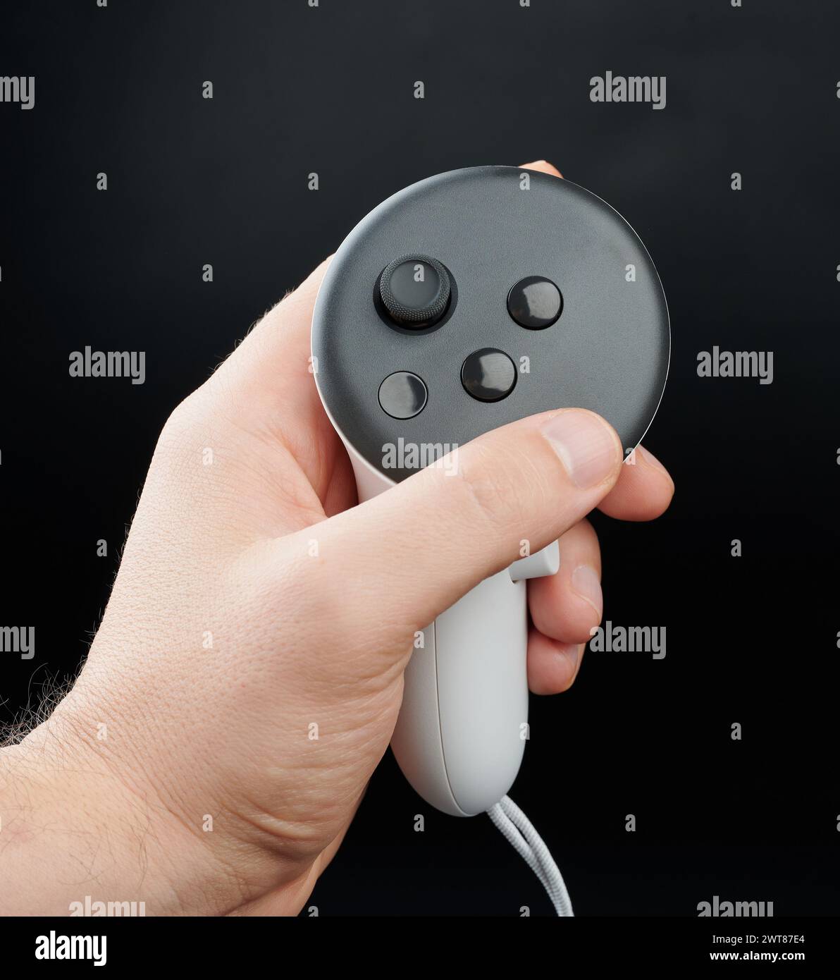 Close up of joystick in hand isolated on black studio background Stock ...