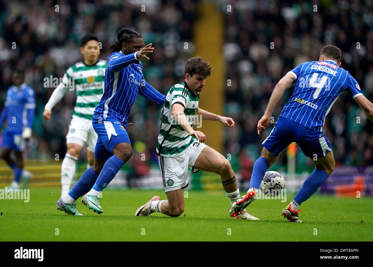 Celtic's Matt O'Riley battles for the ball against St Johnstone's ...