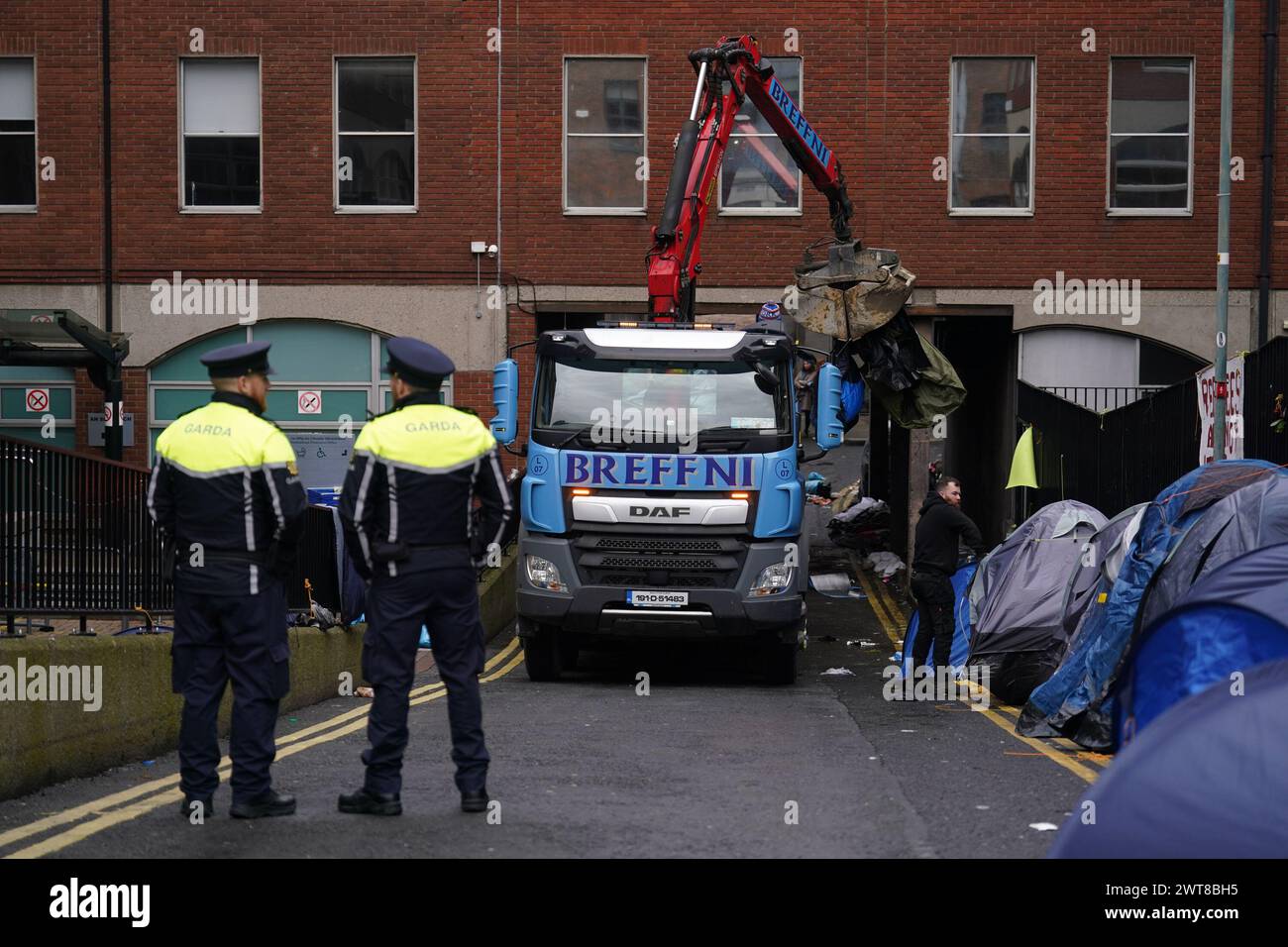 Tents are cleared from a site used by asylum seekers at the ...