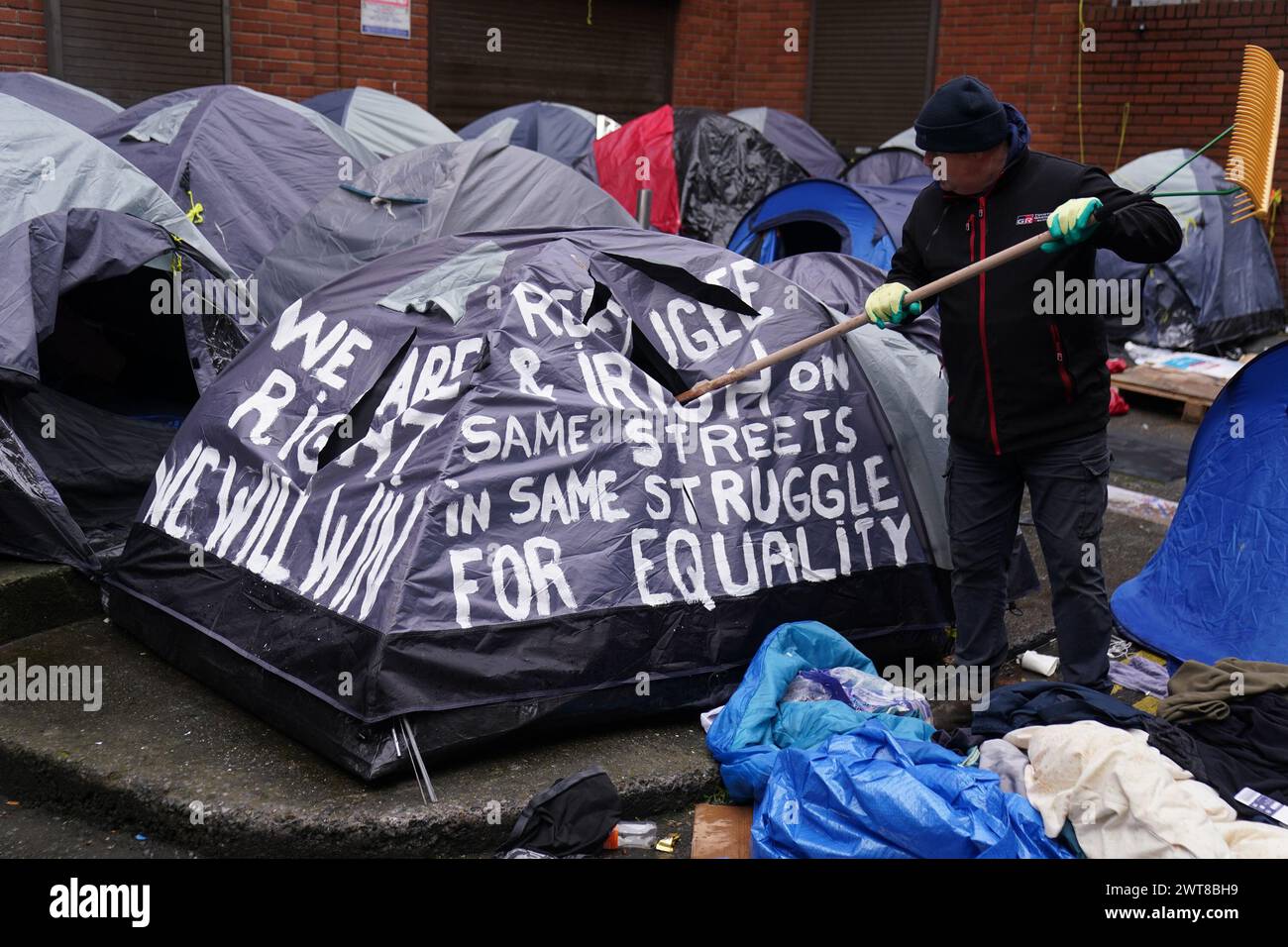 Tents are cleared from a site used by asylum seekers at the ...