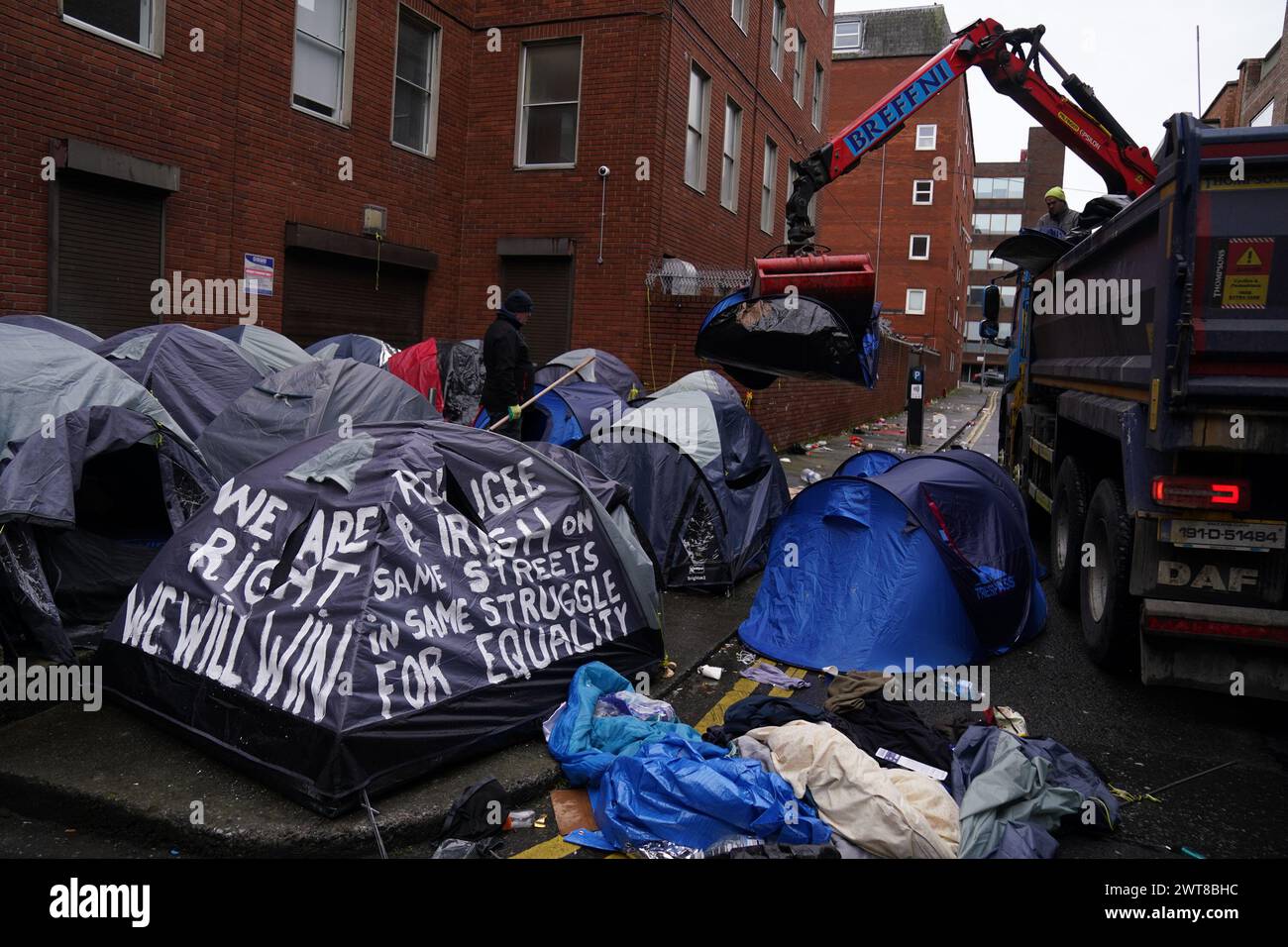 Tents are cleared from a site used by asylum seekers at the ...