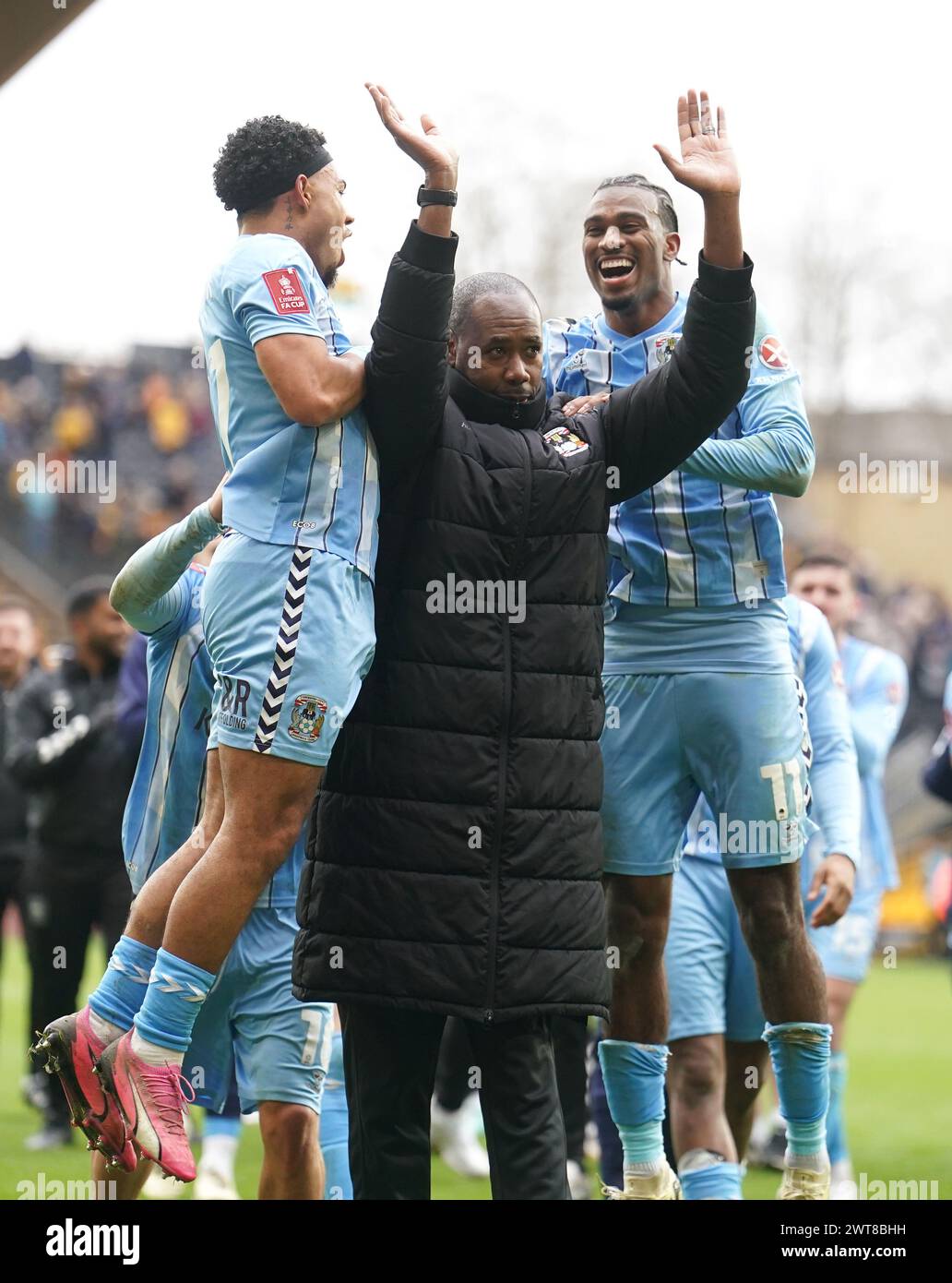 Coventry City first-team coach Dennis Lawrence celebrates victory with ...