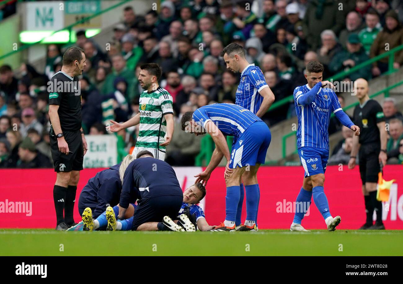 St Johnstone's Sven Sprangler receives medical attention during the ...