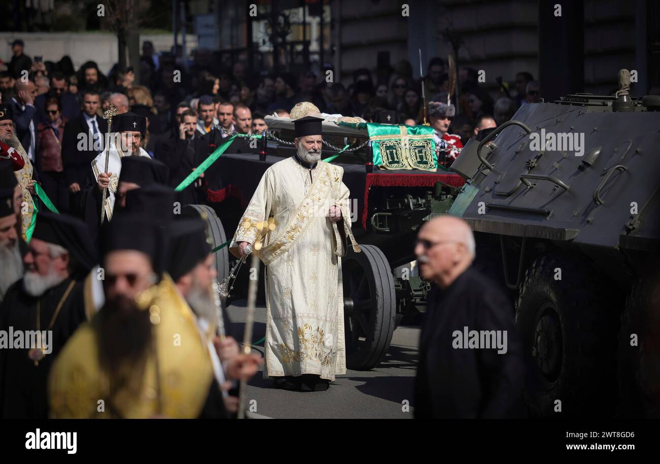 Orthodox clergy, official, honour guards and people walk beside the ...