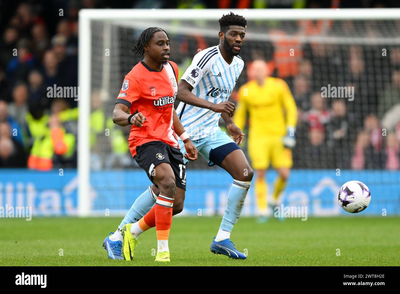 Pelly Ruddock Mpanzu of Luton Town under pressure from Ibrahim Sangare ...