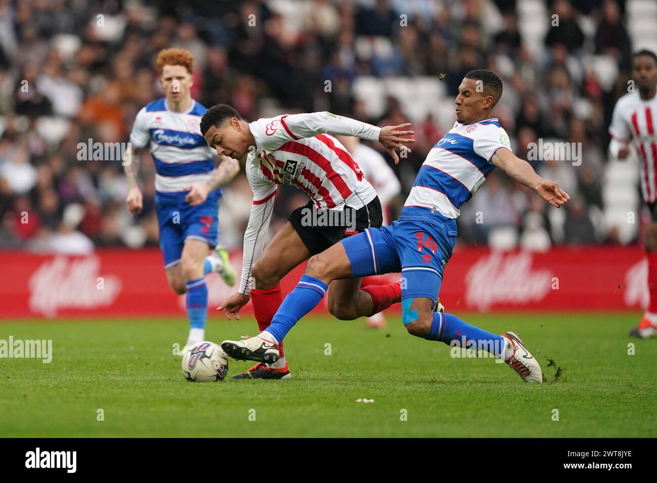 Sunderland's Jobe Bellingham is tackled by Queens Park Rangers' Isaac ...