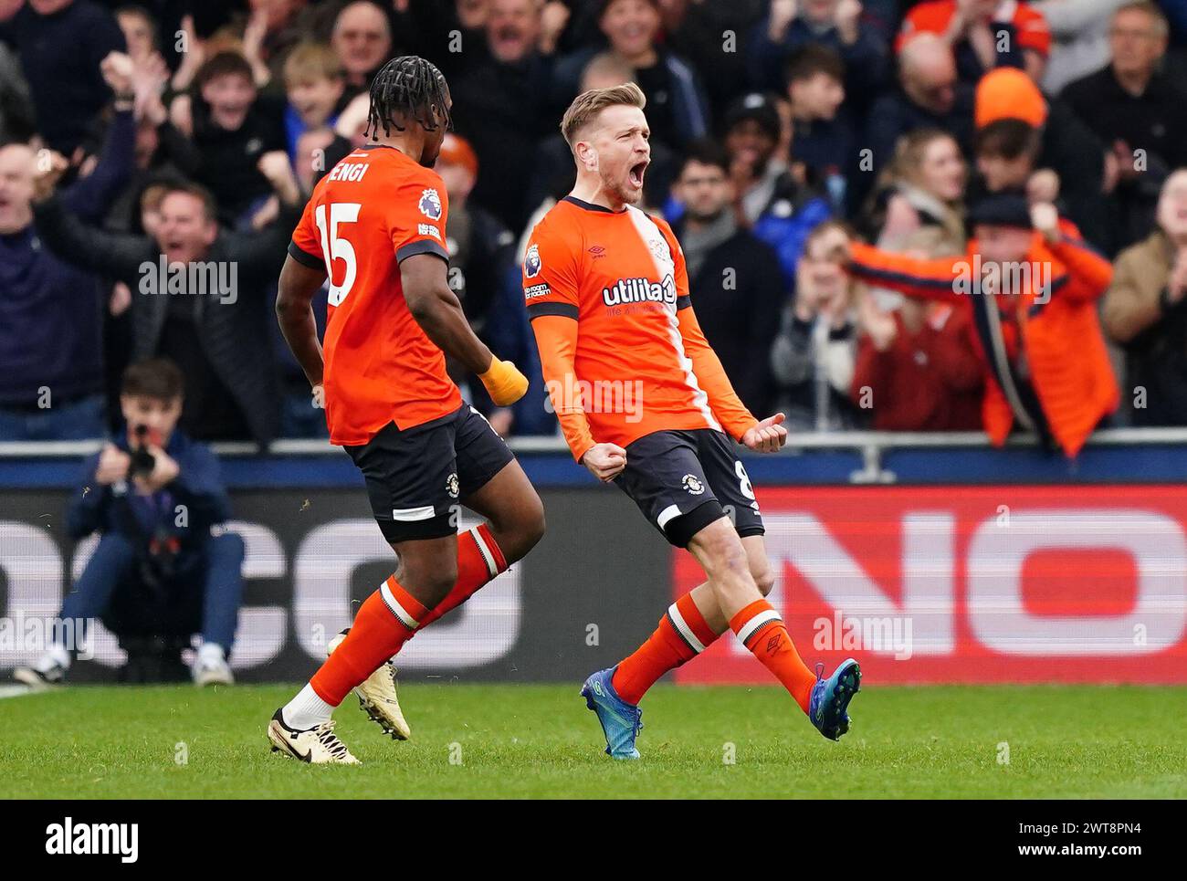 Luton Town's Luke Berry (right) celebrates scoring their first goal of ...
