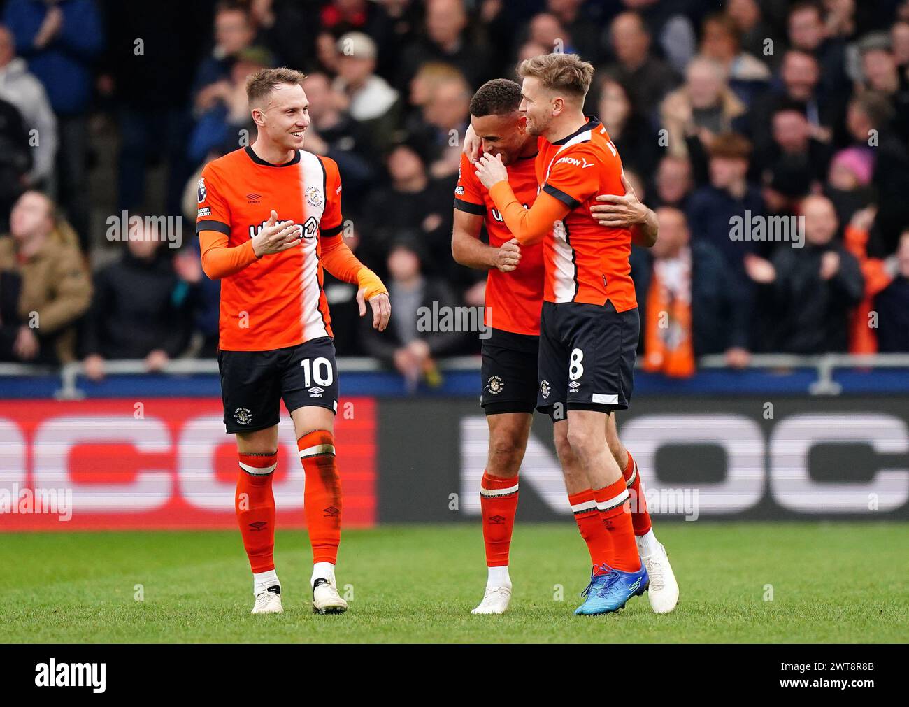 Luton Town's Luke Berry (right) celebrates scoring their first goal of ...