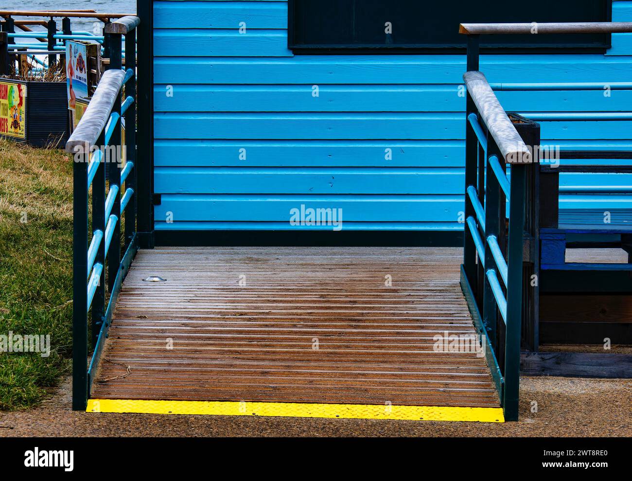 Ramp up to a closed outdoor cafe Stock Photo - Alamy