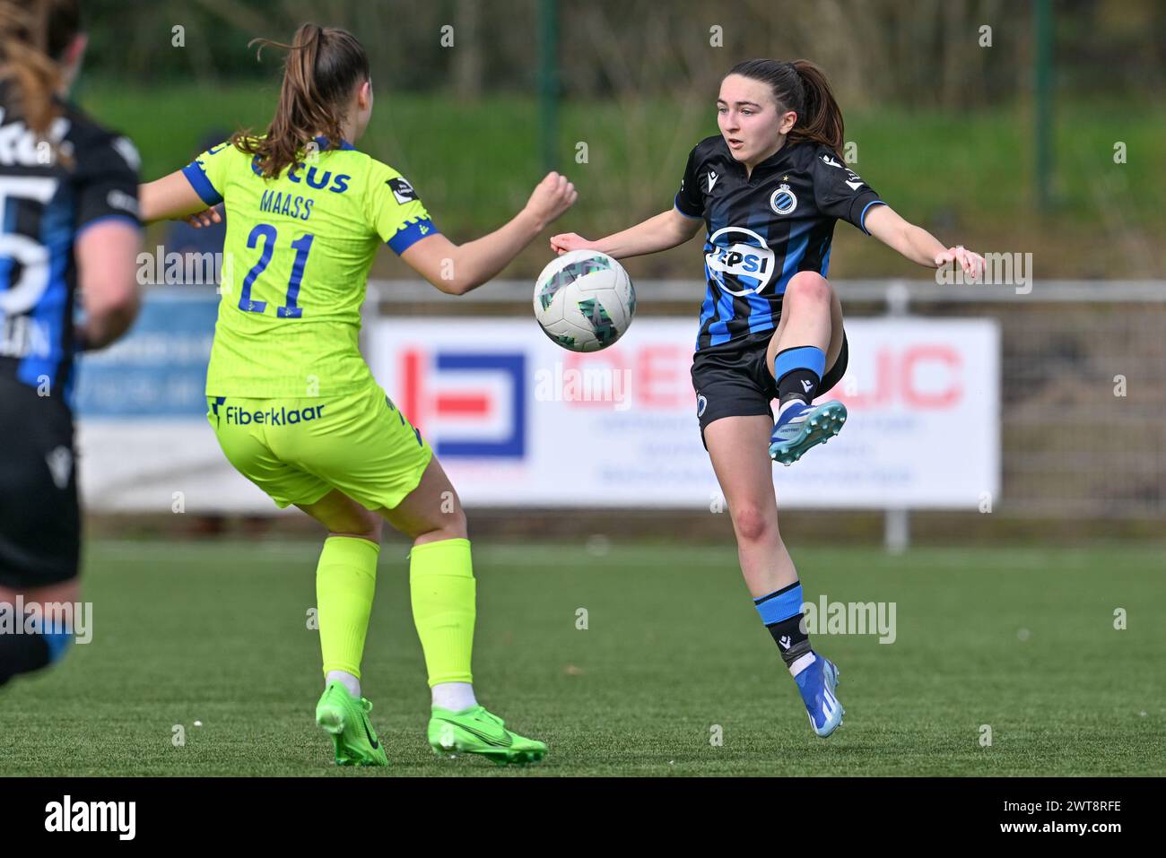 Aalter, Belgium. 16th Mar, 2024. Elfi Maass (21) of AA Gent pictured defending on Angel Kerkhove ...