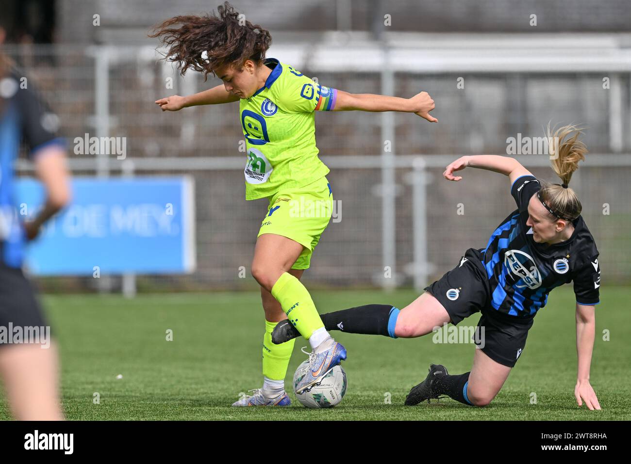 Aalter, Belgium. 16th Mar, 2024. Nia Elyn (4) of AA Gent pictured fighting for the ball with ...