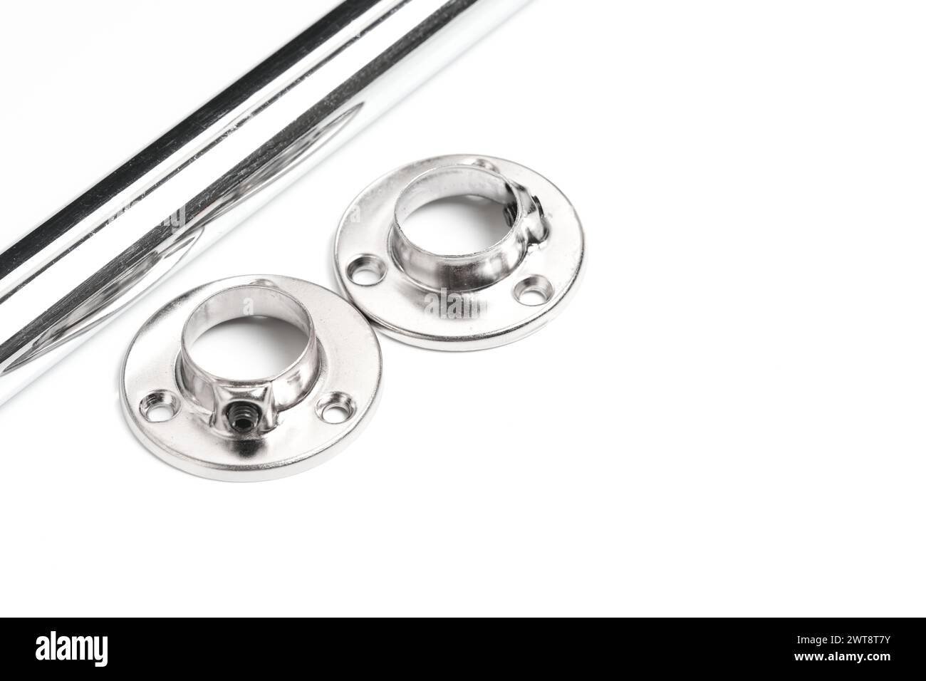 Nickel plated tube and two flanges for its attachment, white background ...