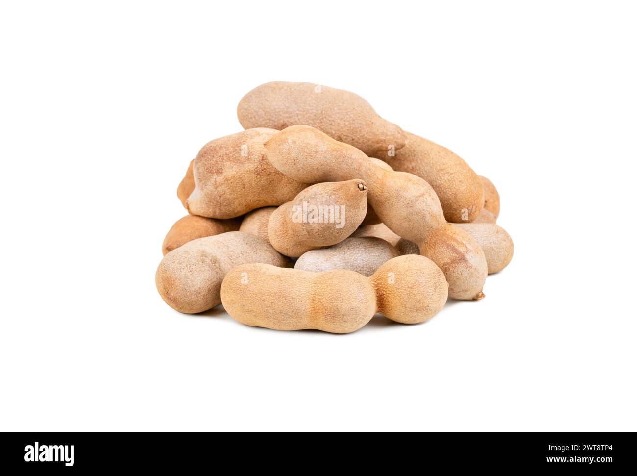 Bunch of tamarind fruits in shell on white background Stock Photo - Alamy
