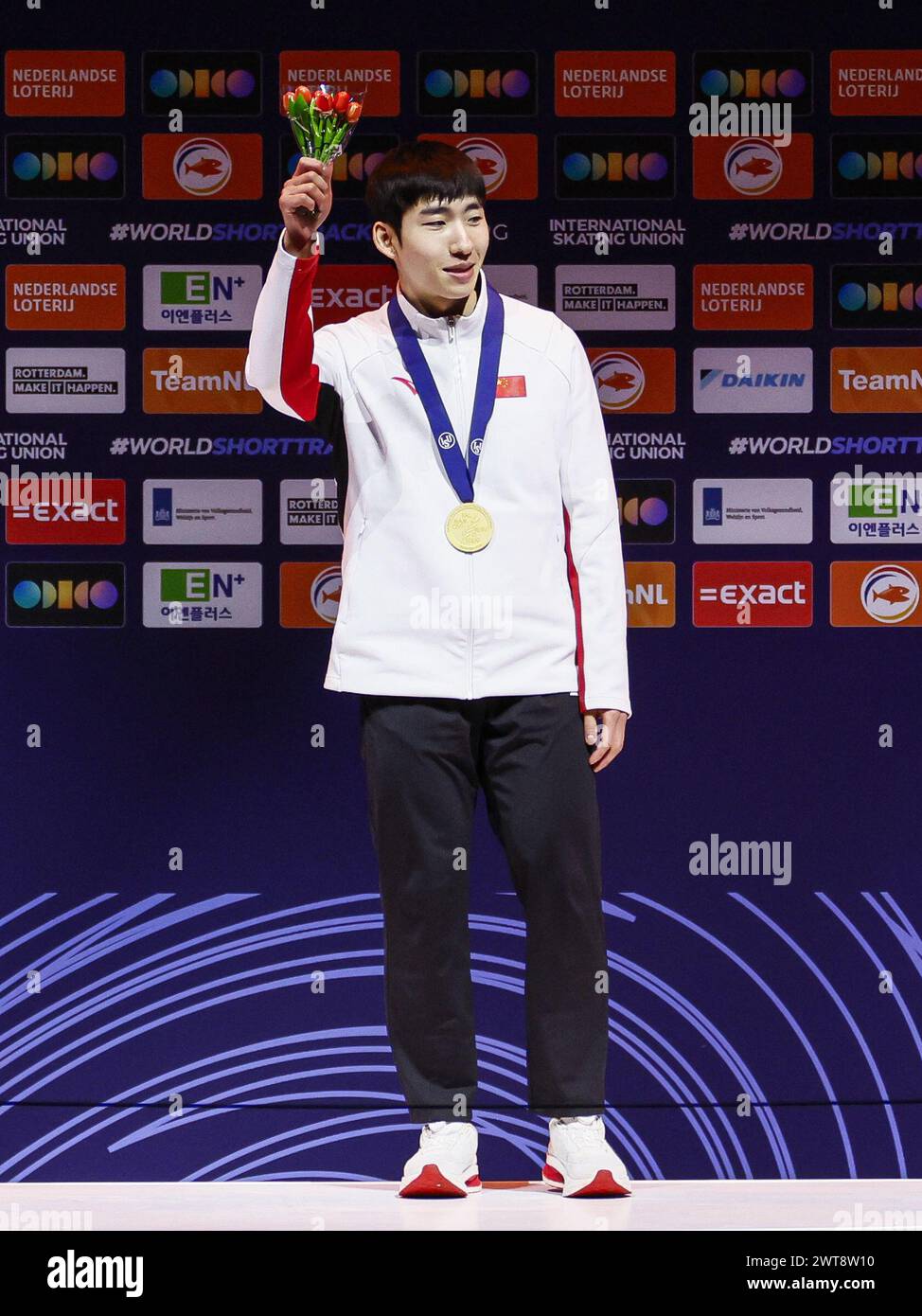 ROTTERDAM - Winner Xiaojun Lin (CHN) on the podium after the 500 meters men at the World Short ...