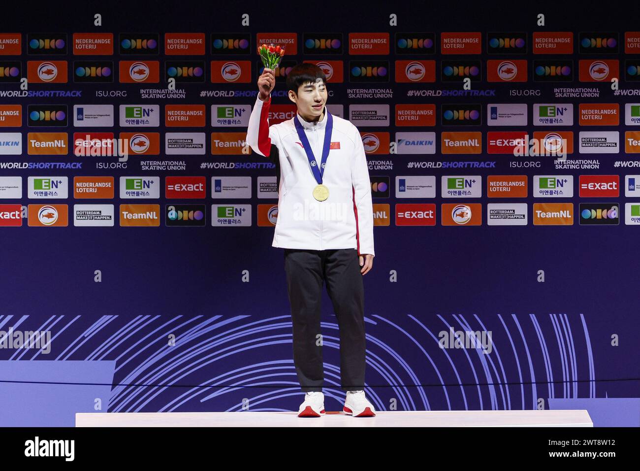 ROTTERDAM - Winner Xiaojun Lin (CHN) on the podium after the 500 meters men at the World Short ...