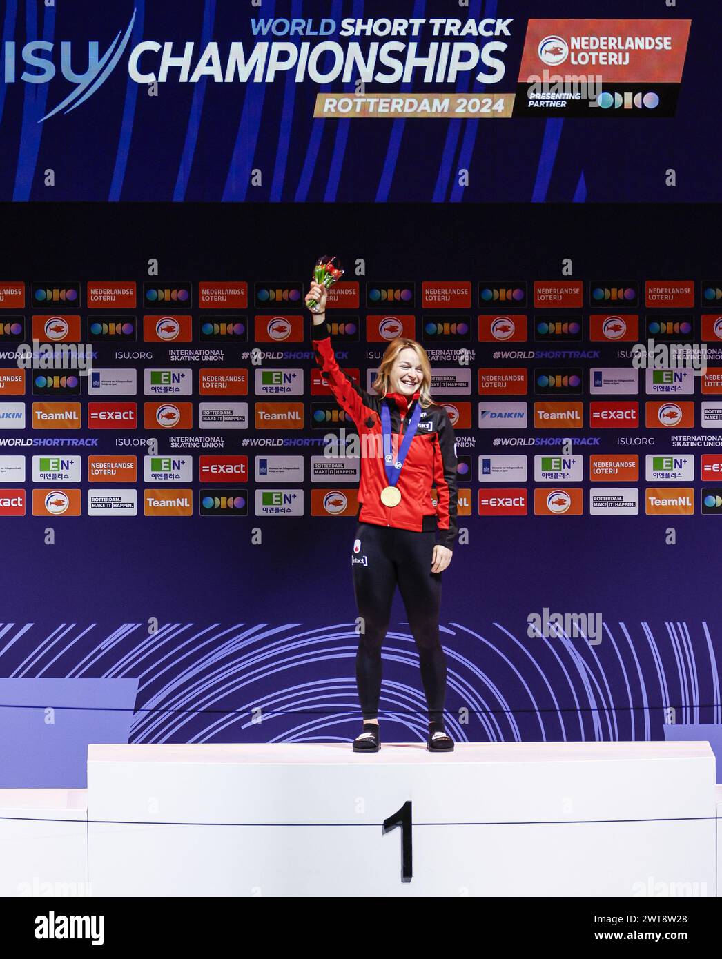 ROTTERDAM - Winner Kim Boutin (CAN) on the podium after the women's 500 ...