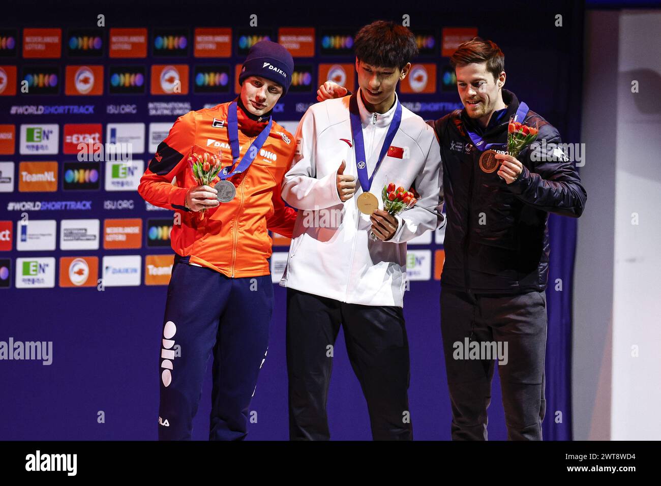 ROTTERDAM - (l-r) Jens van 't Wout (NED), Long Sun (CHN), Brendan Corey ...