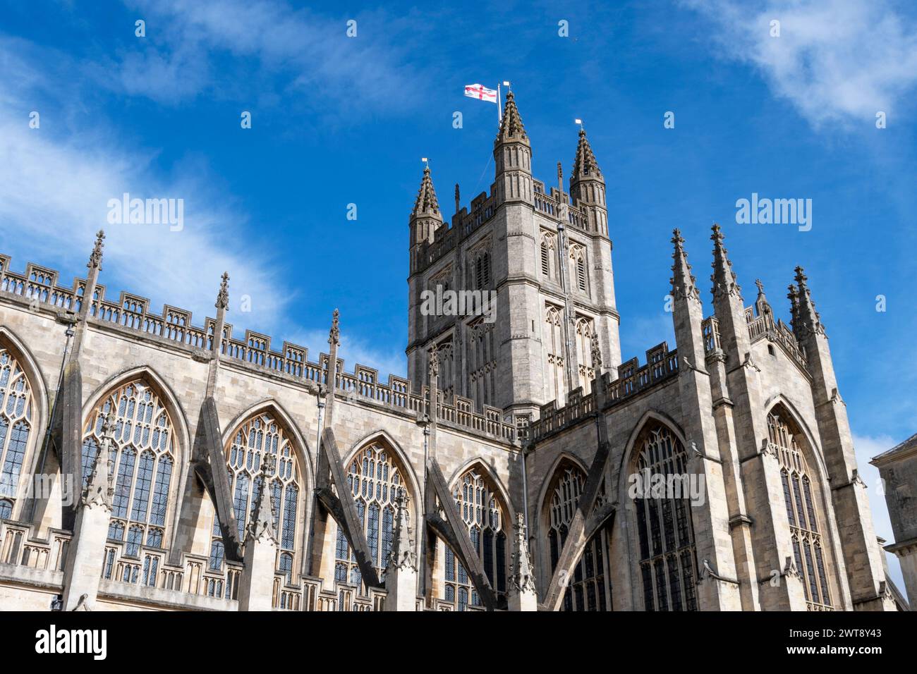 Bath Abbey, Somerset, UK with the St George's flag flying Stock Photo ...